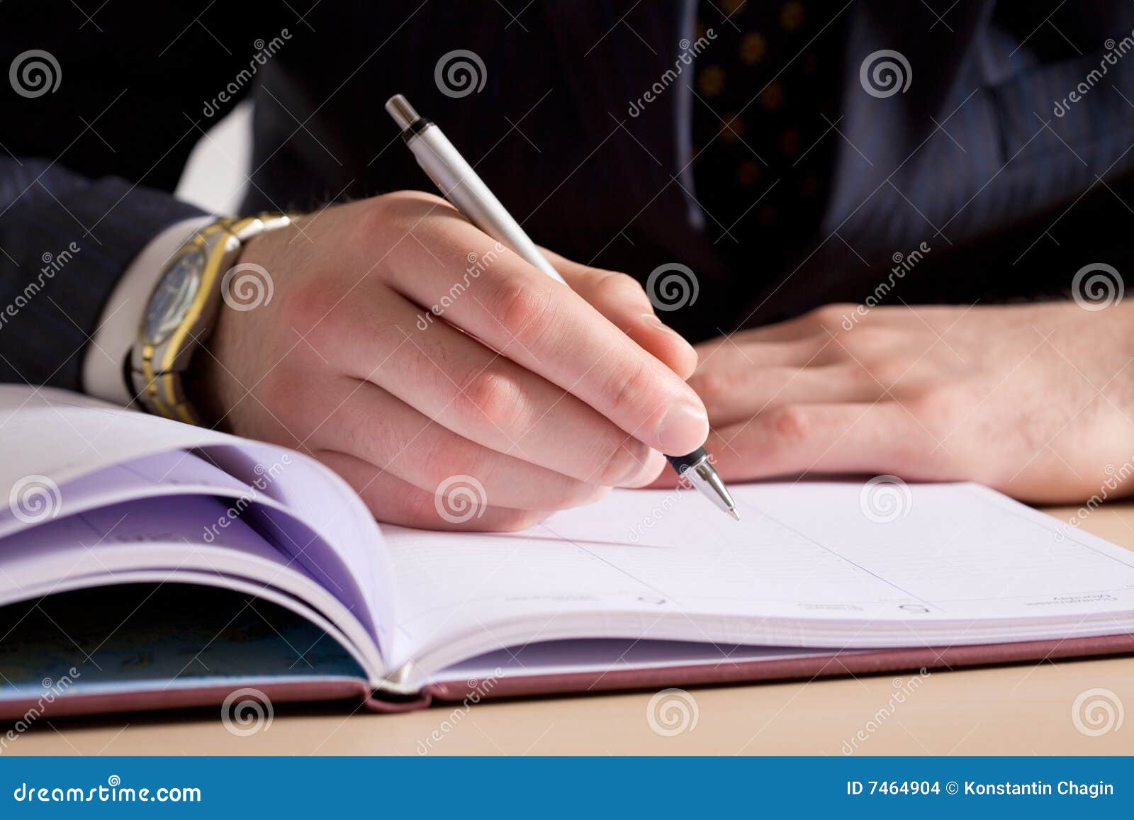 A businessman making notes stock photo. Image of paper - 7464904