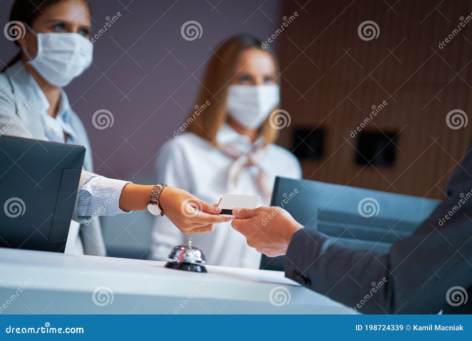 Businessman in Mask at the Reception of a Hotel Checking in Stock Image ...