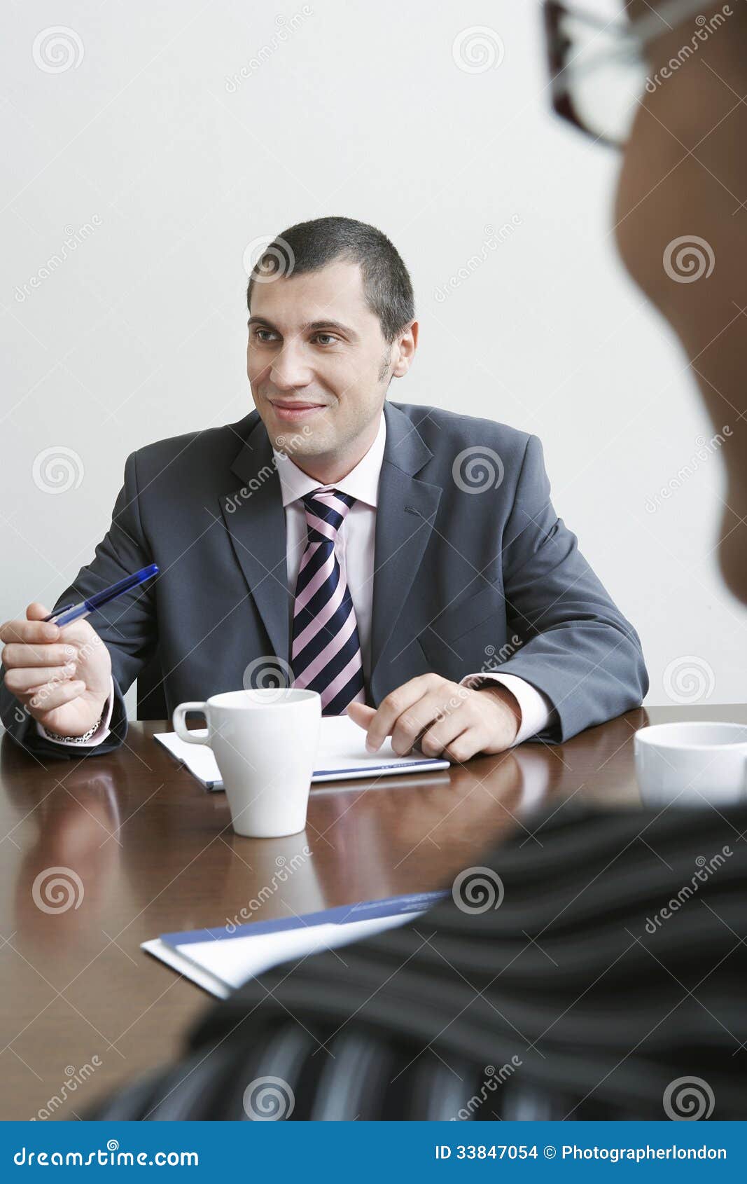 Businessman in Meeting at Conference Table Stock Photo - Image of latin ...