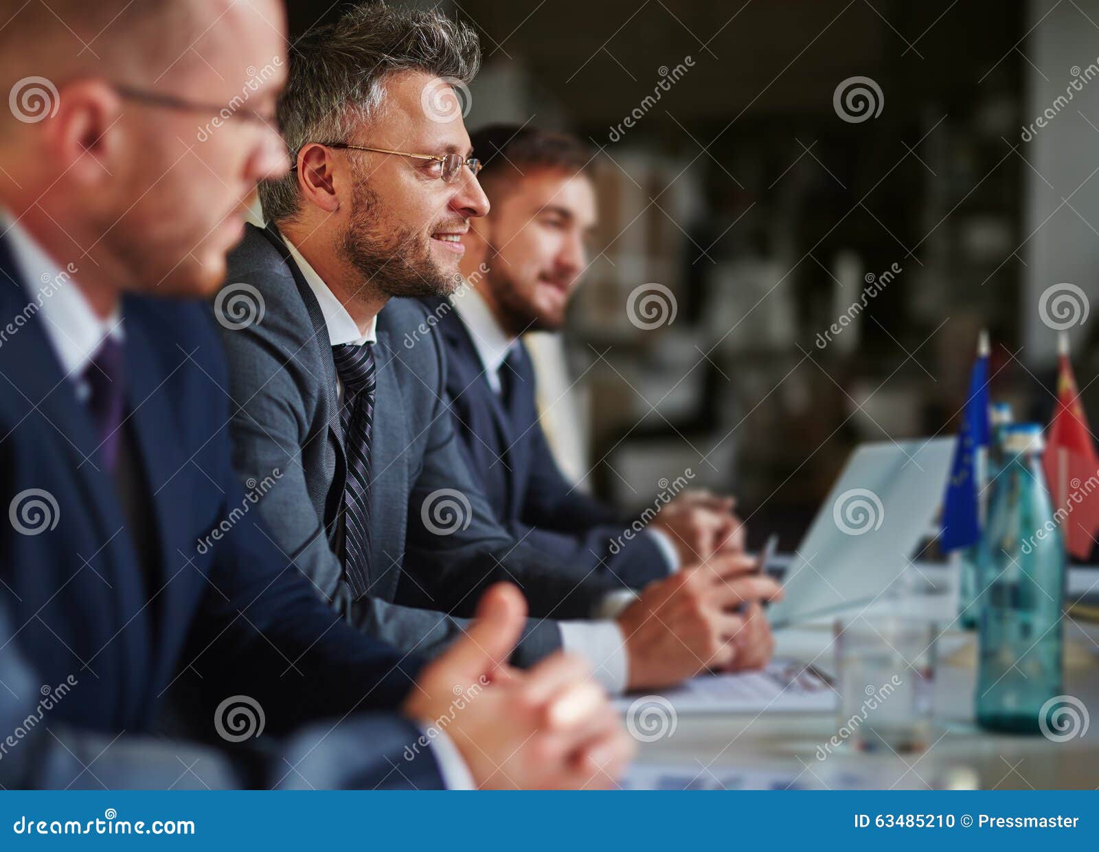 Businessman in a meeting stock photo. Image of smiling - 63485210