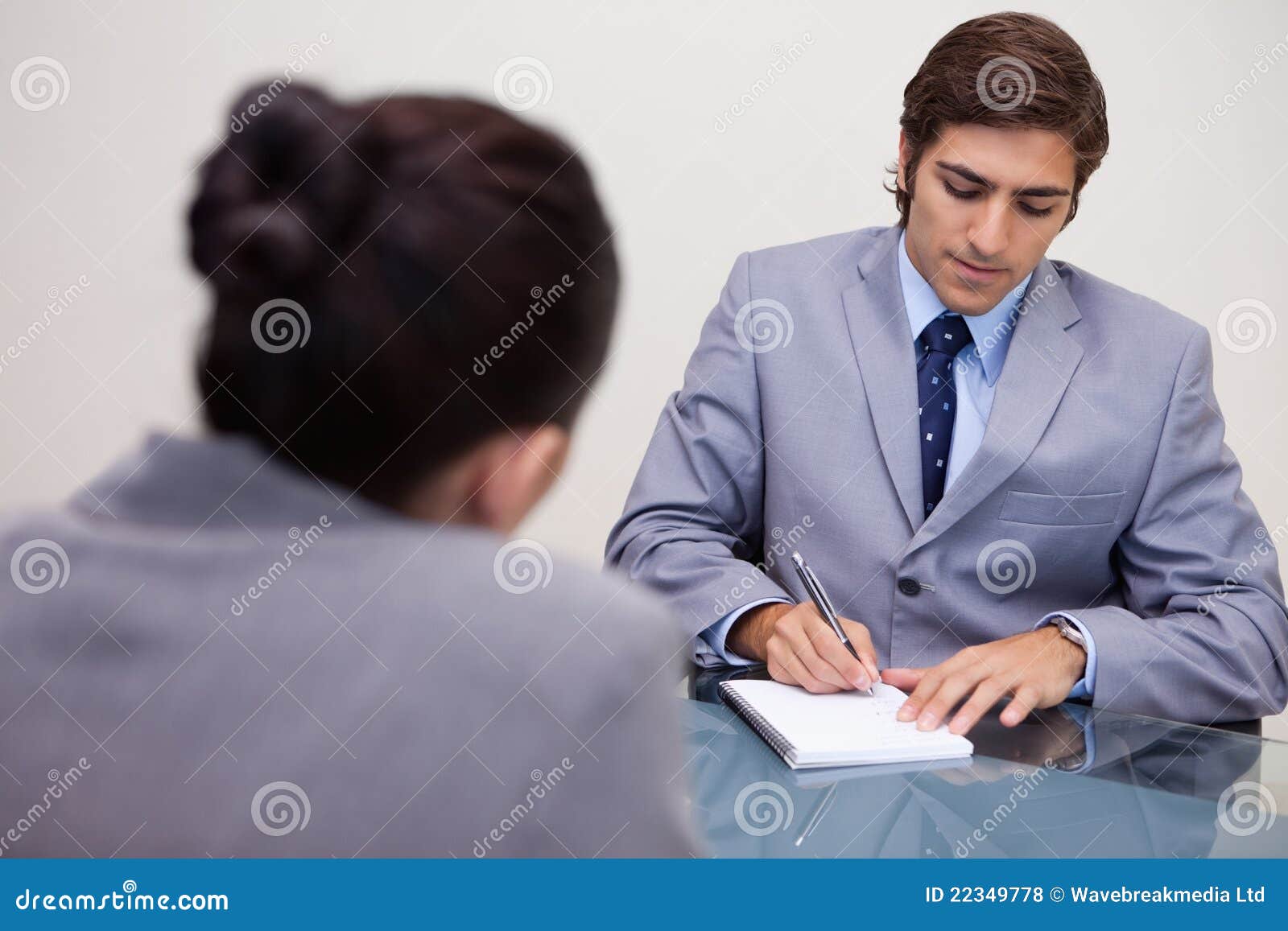 Businessman in Meeting Taking Notes Stock Photo - Image of ...