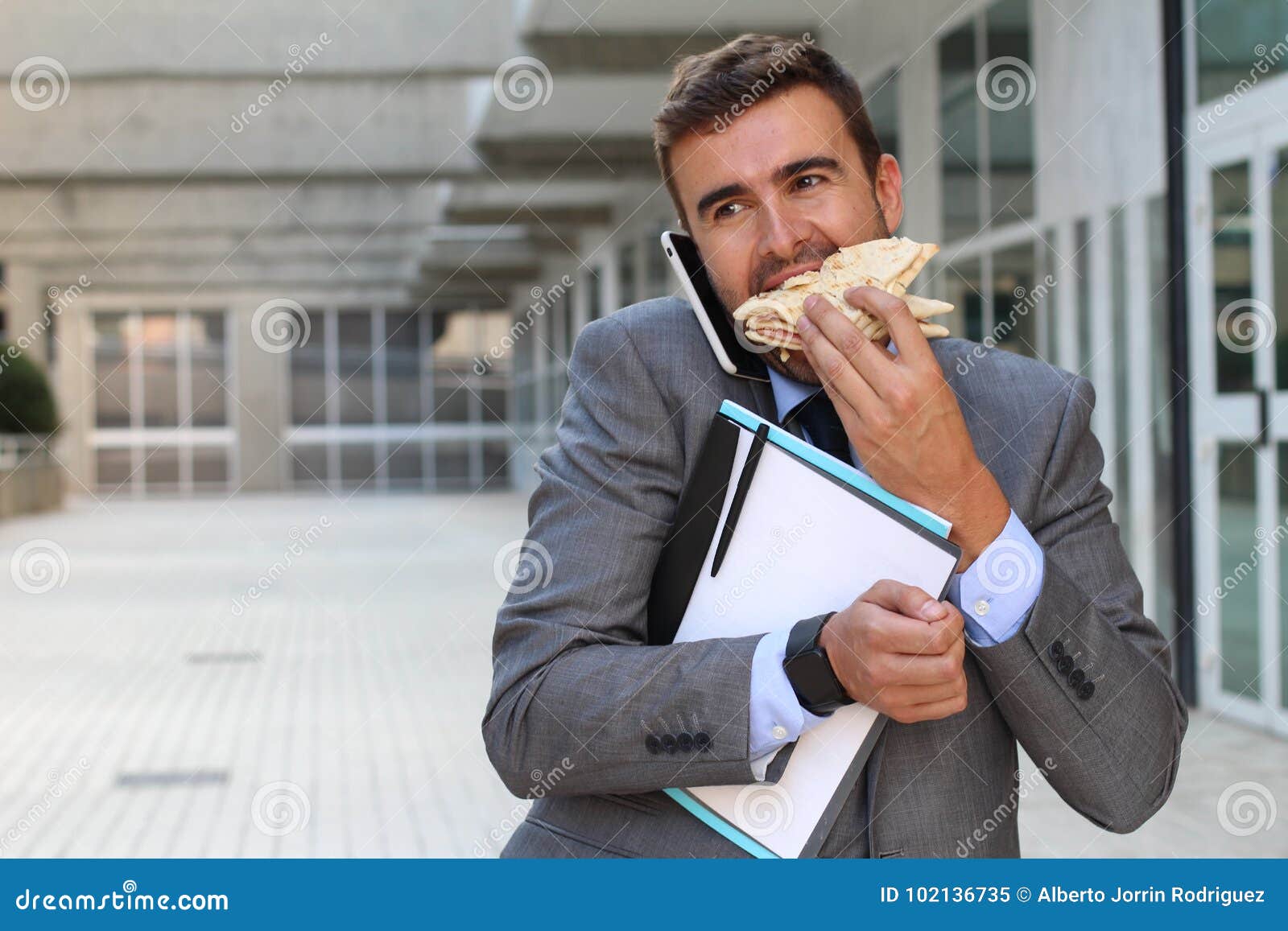Businessman Multitasking on the Go Stock Image - Image of handsome ...