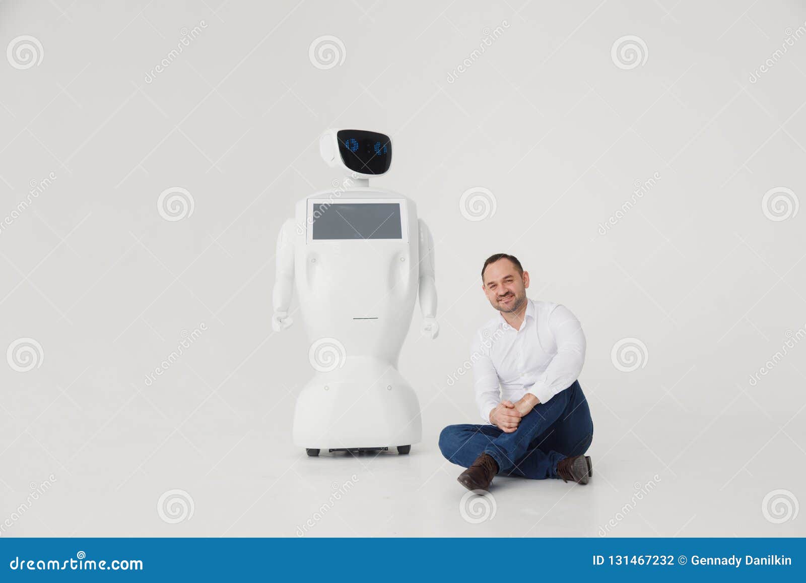 Humanoid Autonomous Robot with Stylish Man in a Suit. Modern Robotic ...