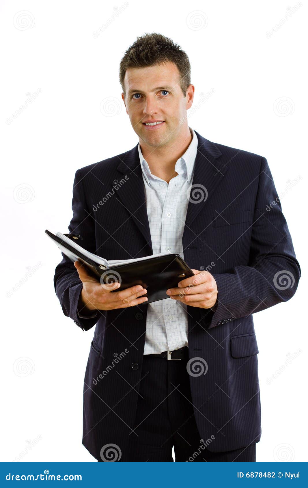 Businessman with notebook stock photo. Image of expression - 6878482
