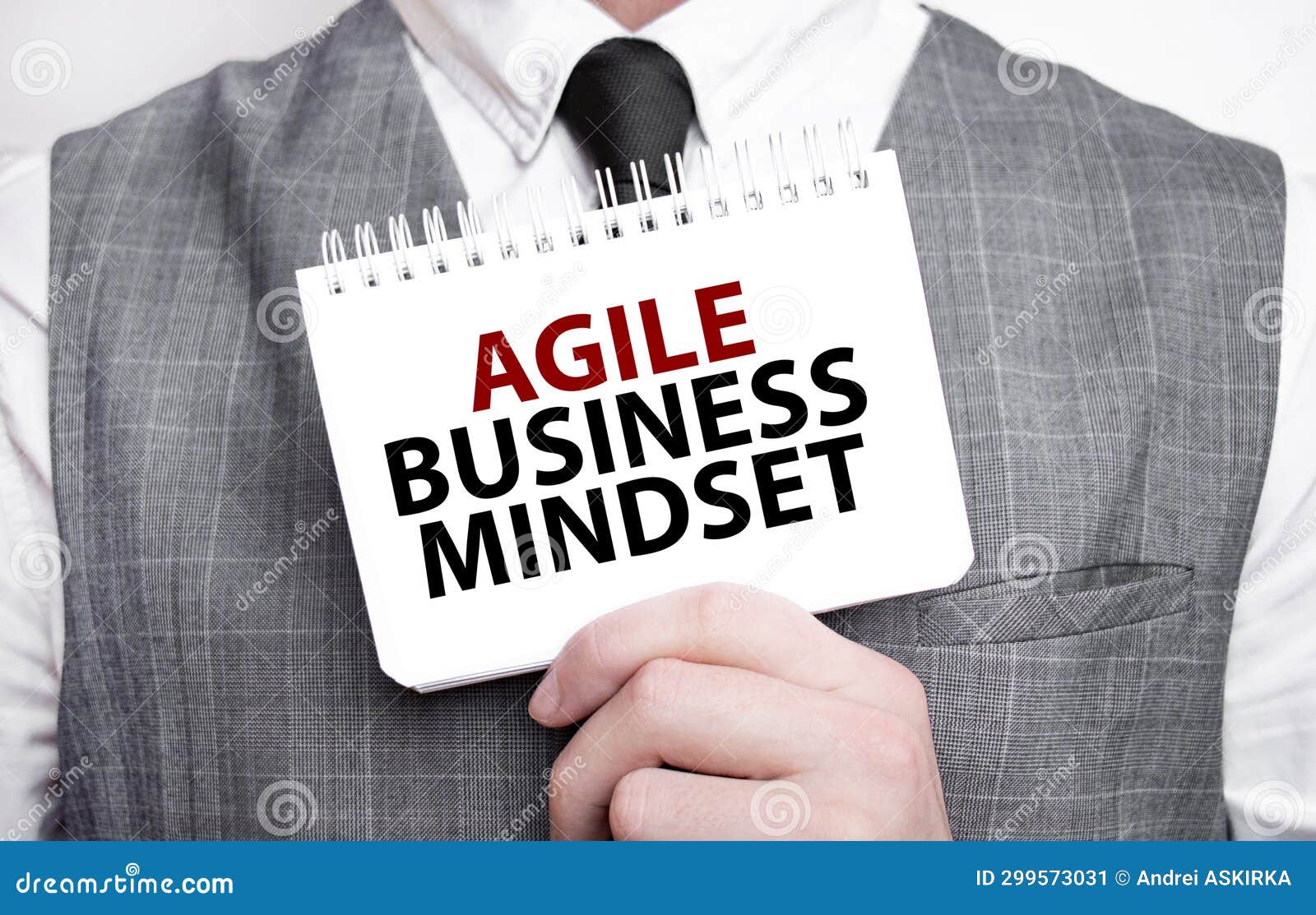 Businessman with Notebook with Text AGILE BUSINESS MINDSET Stock Image ...