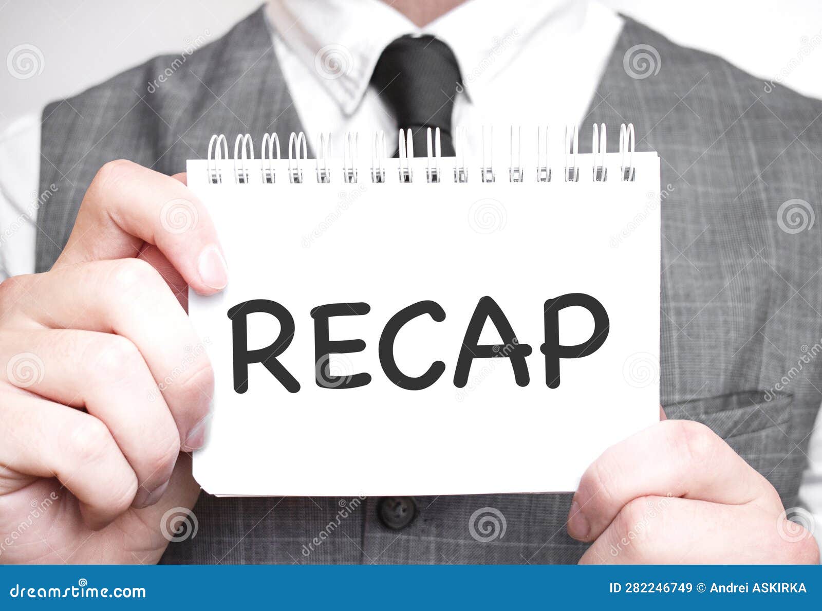 Businessman with Notebook with Text RECAP. Concept Stock Image - Image ...