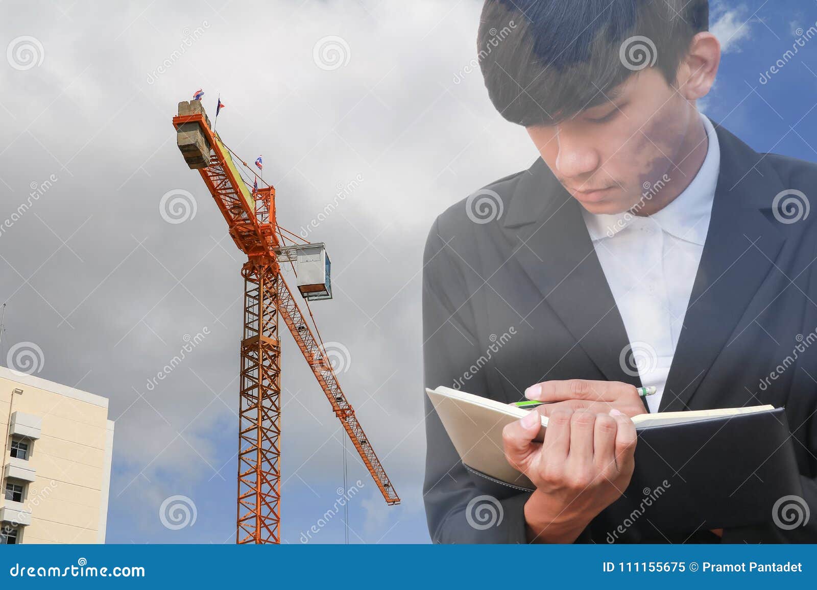 Businessman with Notepad in Hand Signing Documents in Construction Site ...