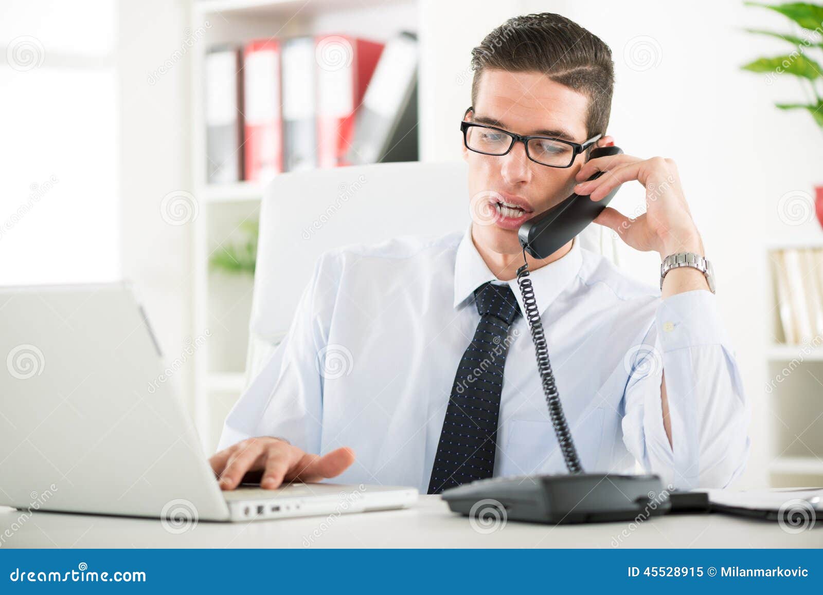 Businessman in the office stock image. Image of desk - 45528915