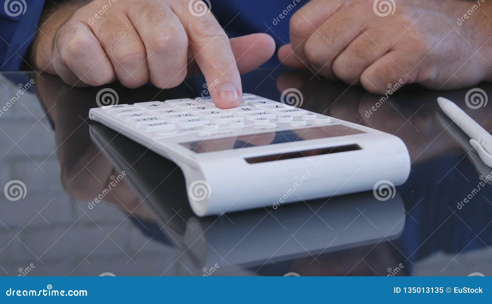 Businessman in Office Calculating Using Adding Machine Stock Image ...