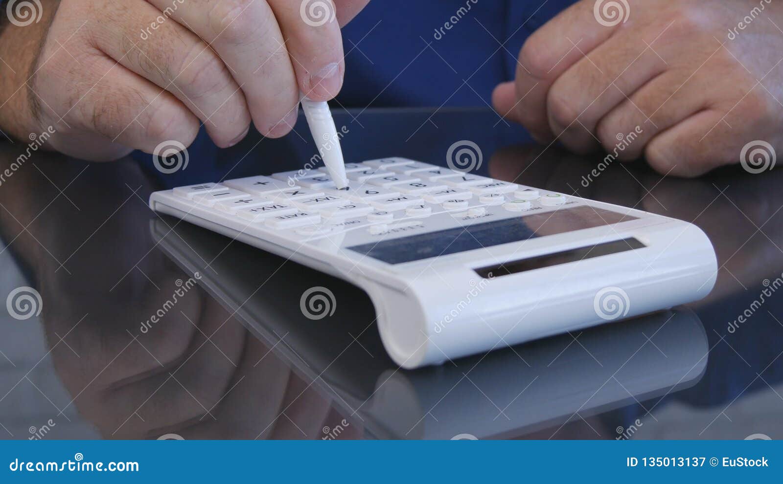Businessman in Office Calculating Using Adding Machine Stock Image ...