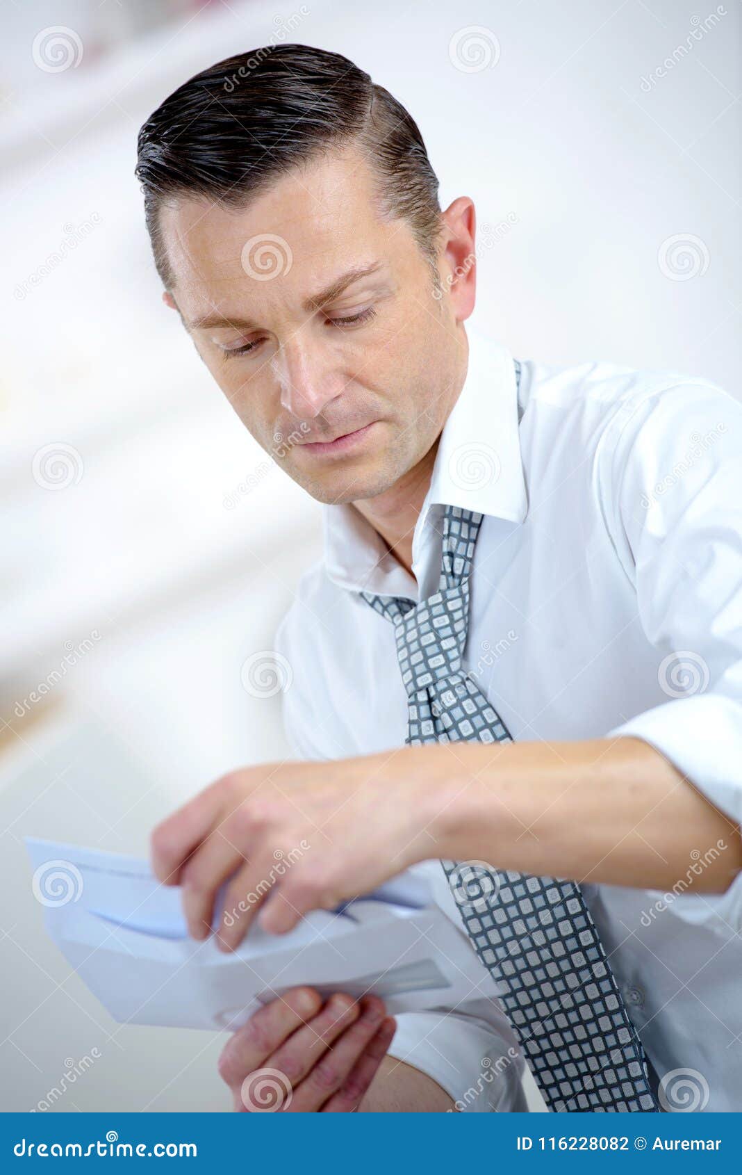 Businessman Opening an Envelope Stock Photo - Image of file, finance ...