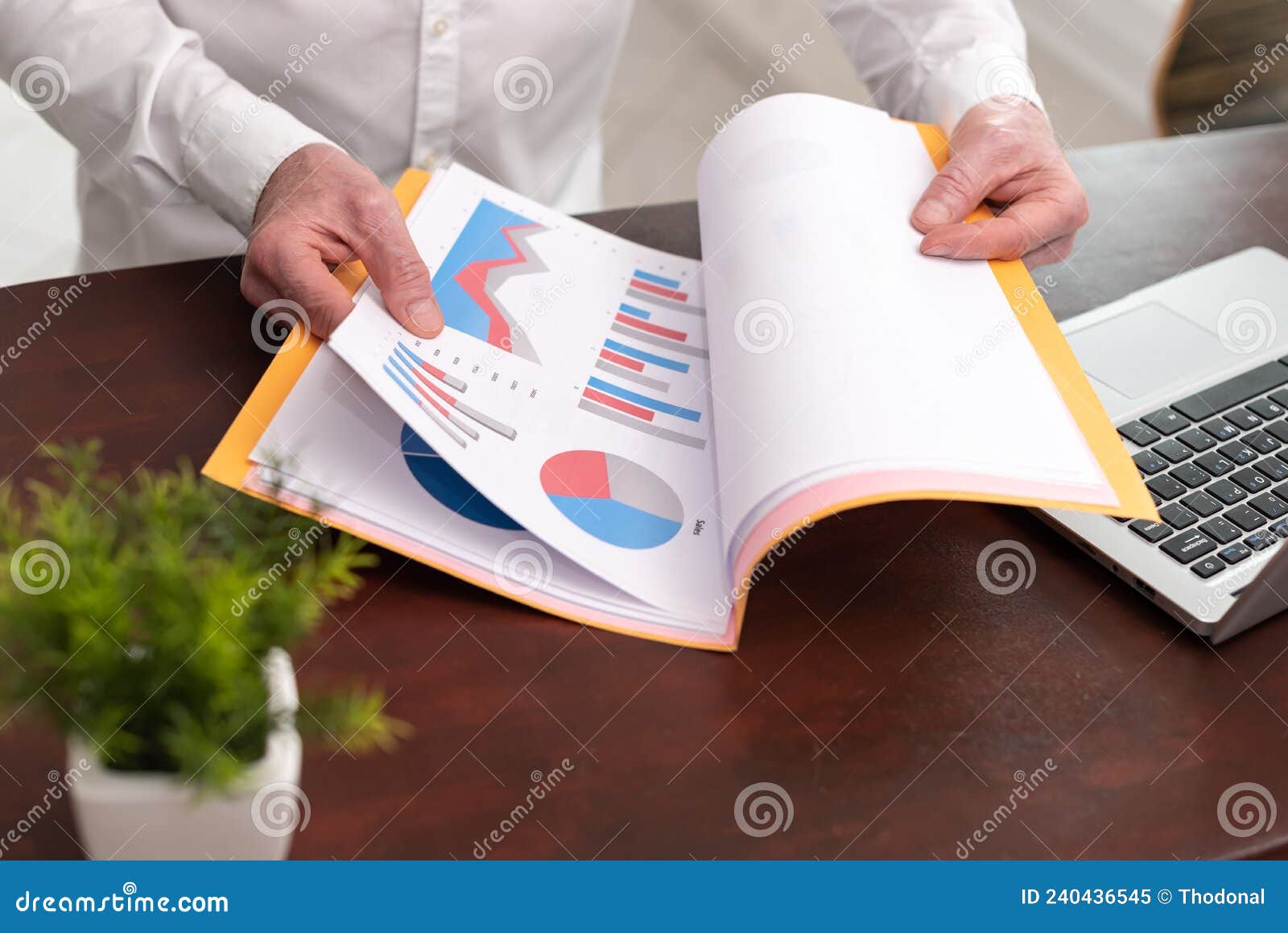 Businessman opening folder stock image. Image of businessman - 240436545