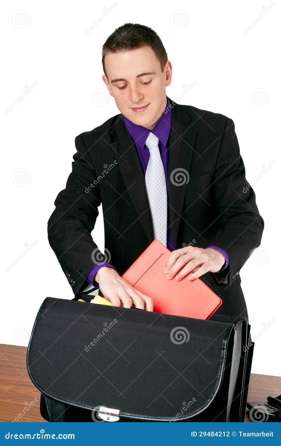 Businessman Packing His Briefcase Stock Photo - Image of work, studio ...