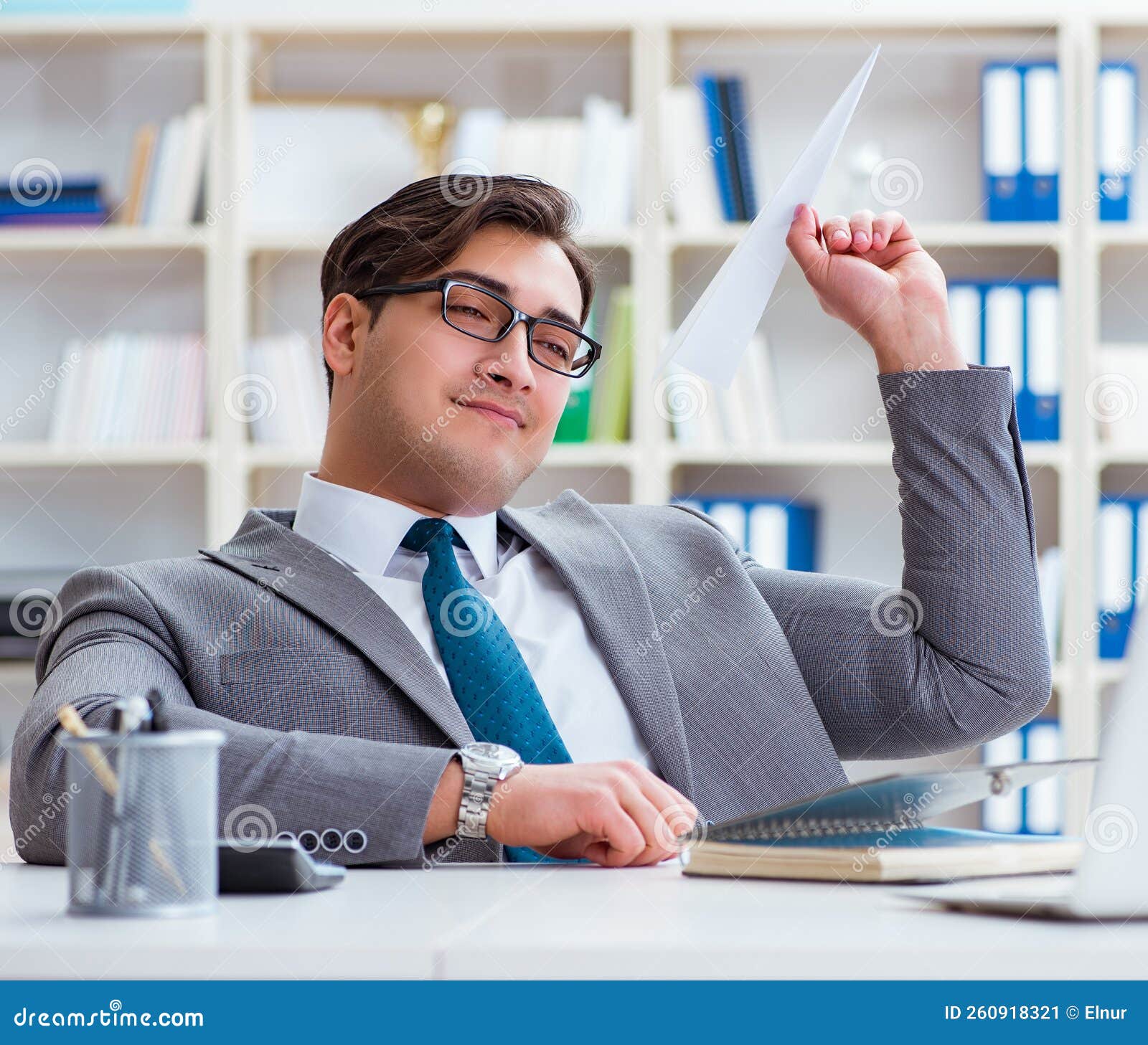 Businessman with Paper Airplane in Office Stock Image - Image of ...