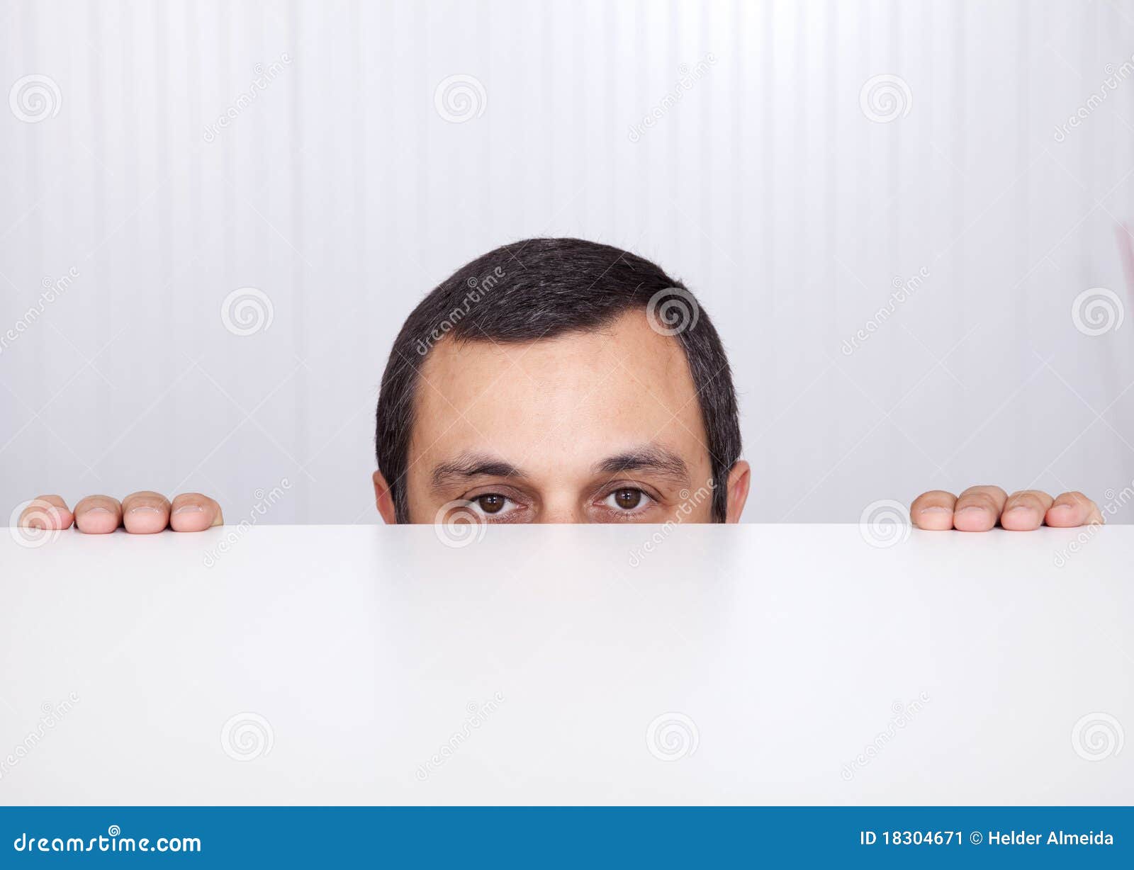 Businessman Peeking Behind the Desk Stock Image - Image of human, table ...