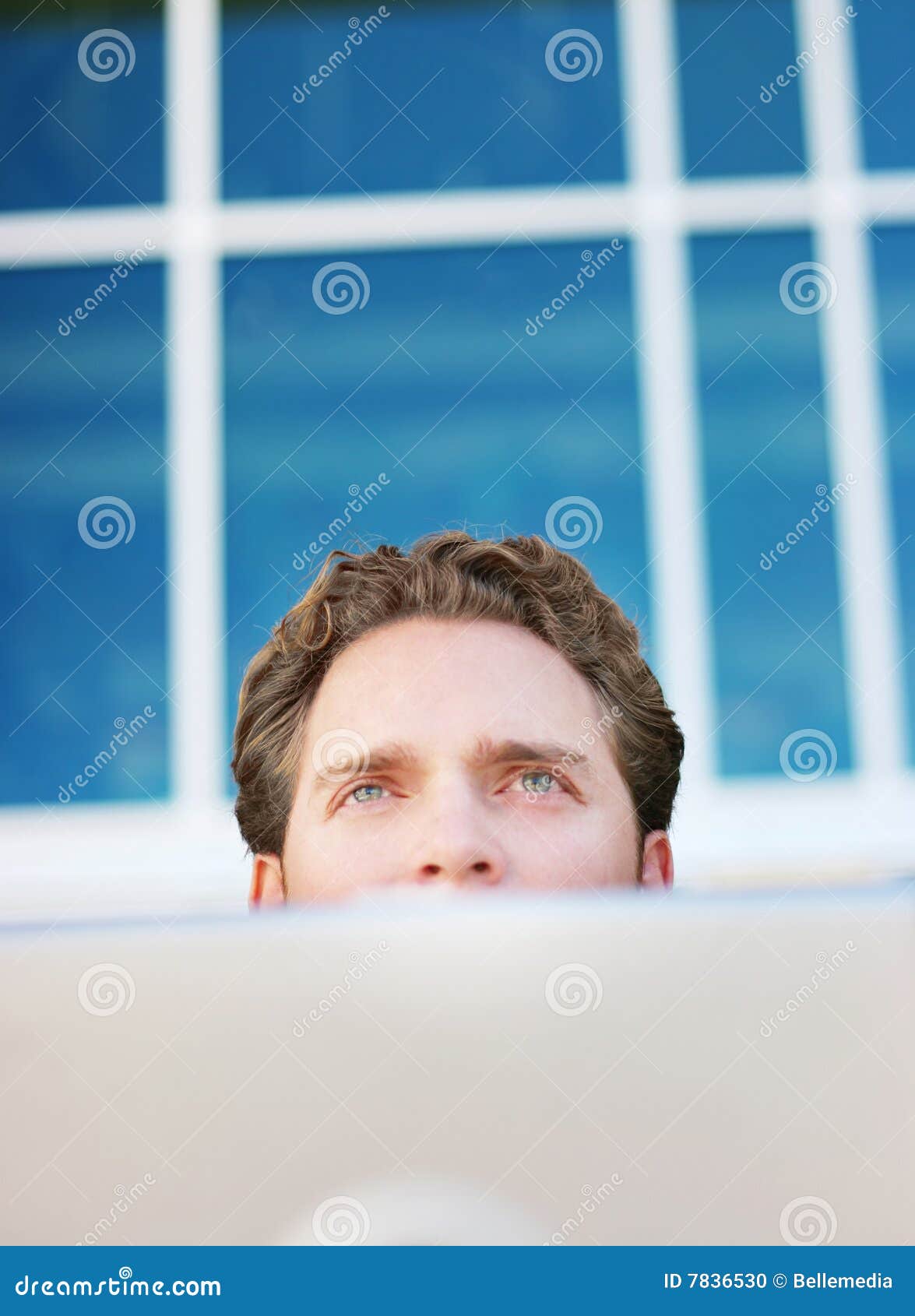 Businessman Peering Over Laptop Stock Photo - Image of corporate ...