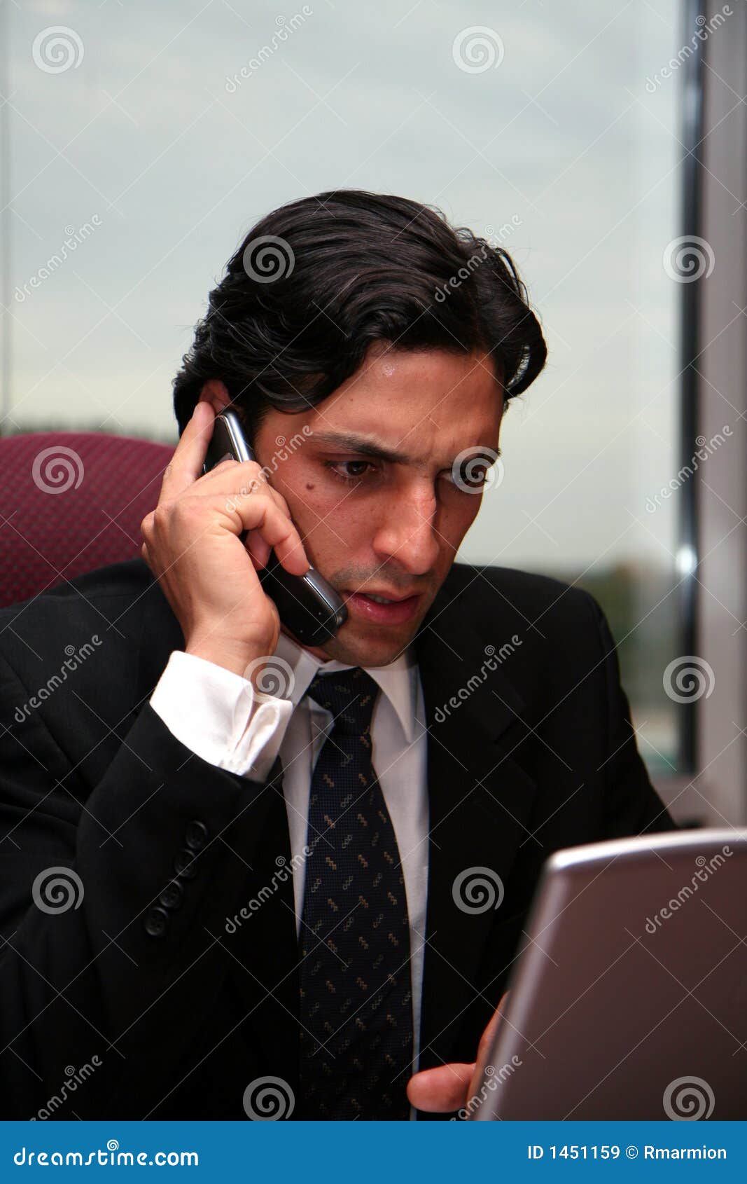 Businessman on Phone stock image. Image of notebook, executive - 1451159