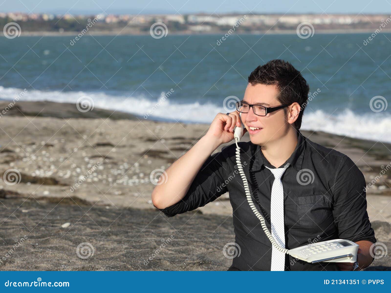 Businessman on the Phone at Beach Stock Image - Image of beach, sitting ...