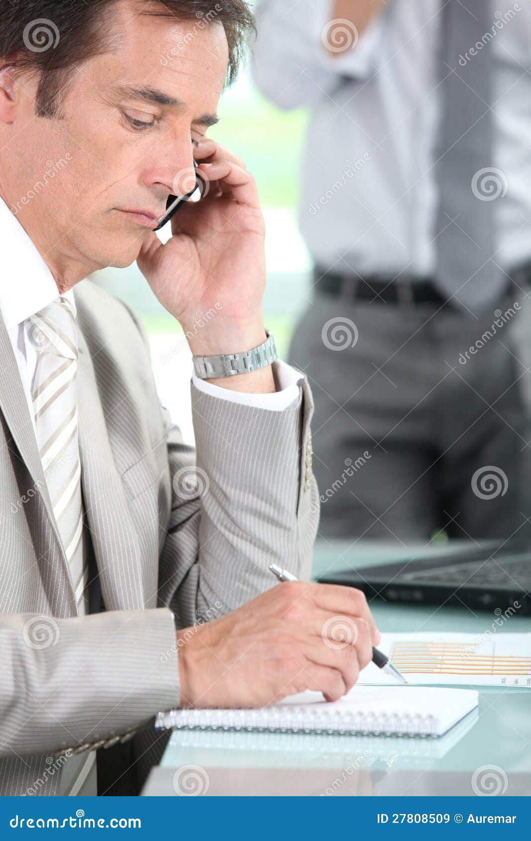 A businessman phoning stock image. Image of suit, grey - 27808509