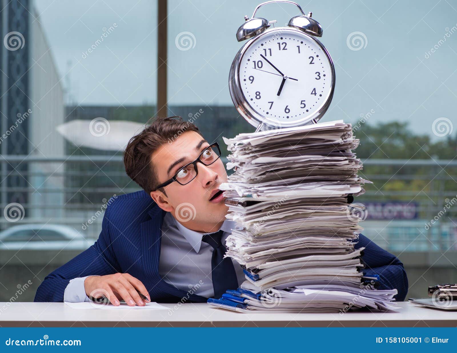 Businessman with Pile Stack of Paper Paperwork and an Alarm Cloc Stock ... Businessman with Pile Stack of Paper Paperwork and an Alarm Cloc Stock ...