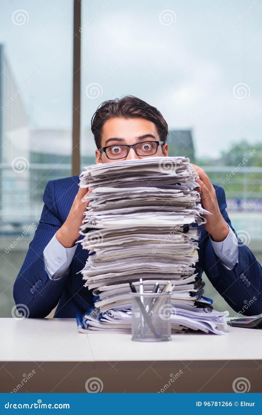 The Businessman with Pile Stack of Paper Paperwork in the Office Stock ...