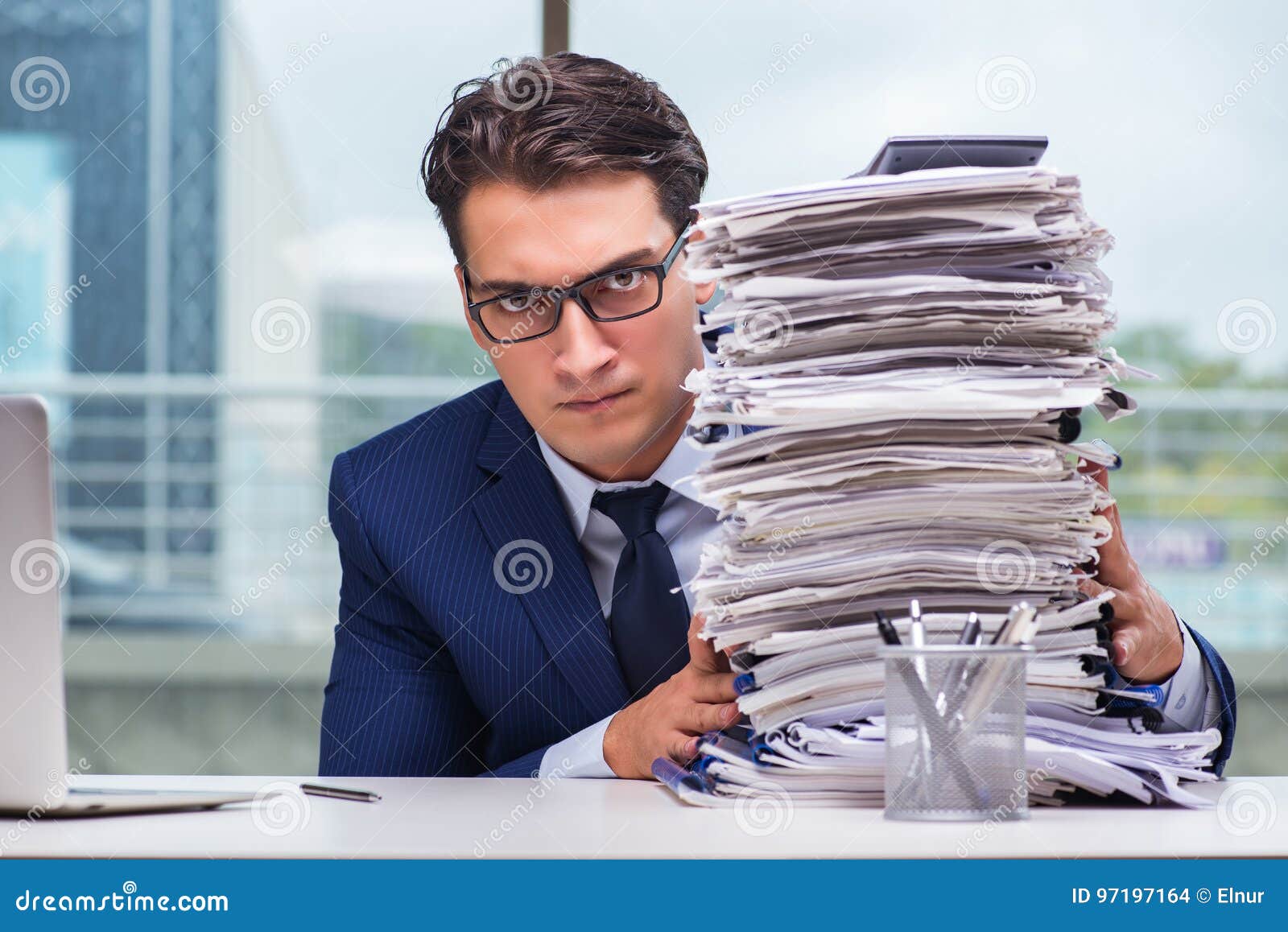 The Businessman with Pile Stack of Paper Paperwork in the Office Stock ...
