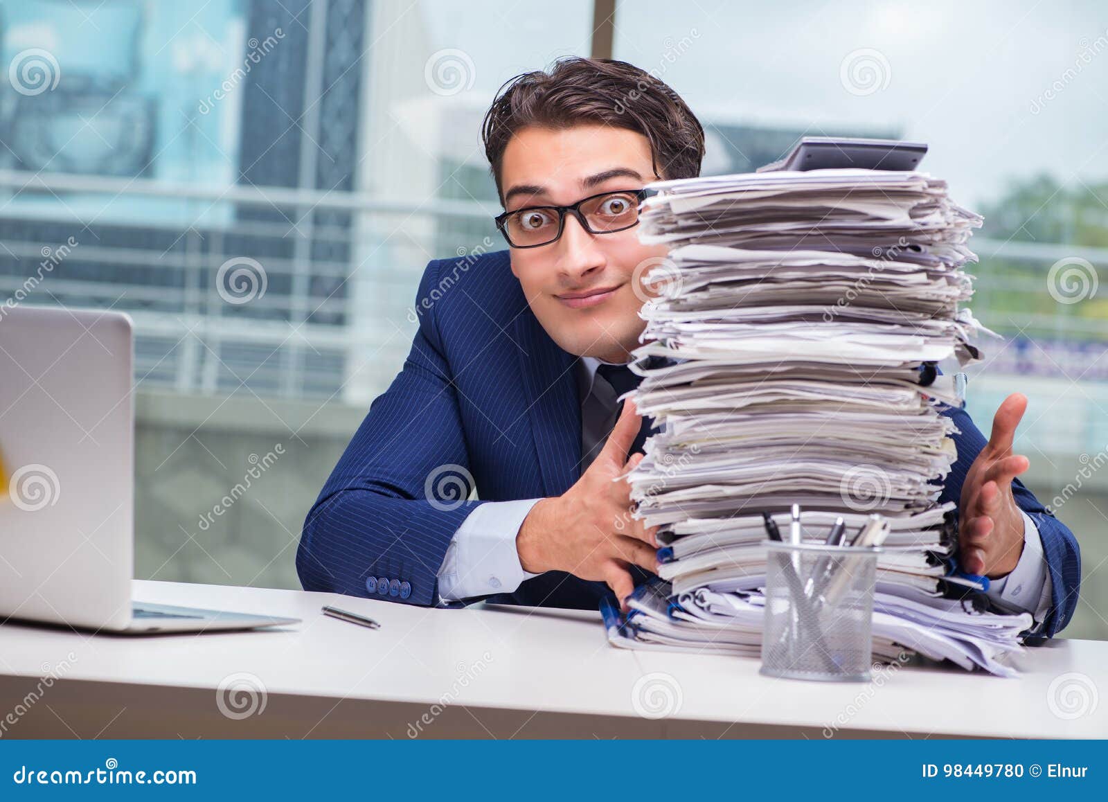The Businessman with Pile Stack of Paper Paperwork in the Office Stock ...