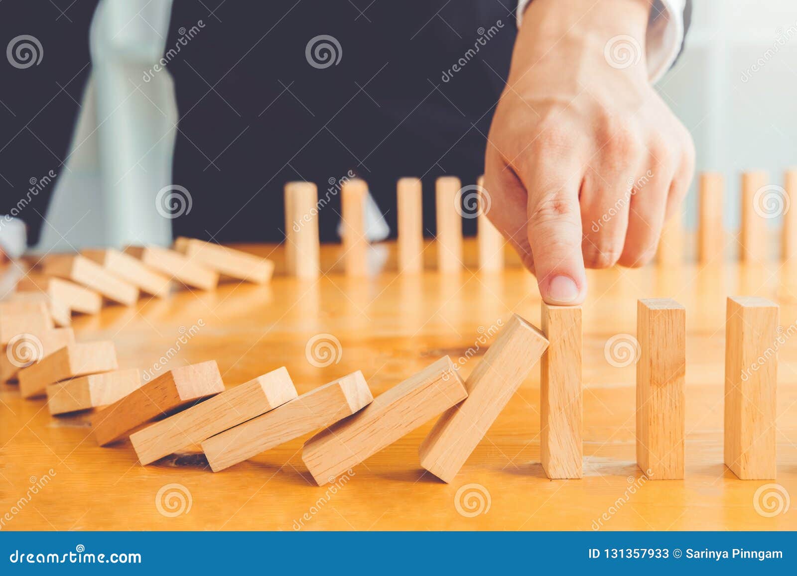 Businessman Plan and Strategy in Business Domino Effect Problem Stock ...