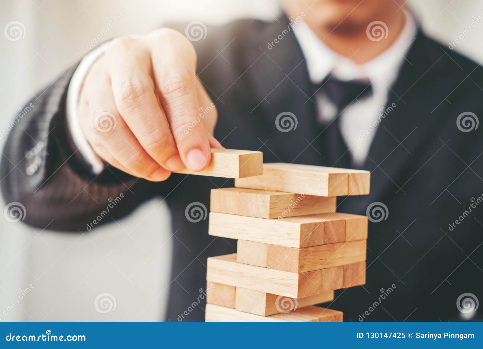 Businessman Plan and Strategy in Business Domino Effect Problem Stock ...