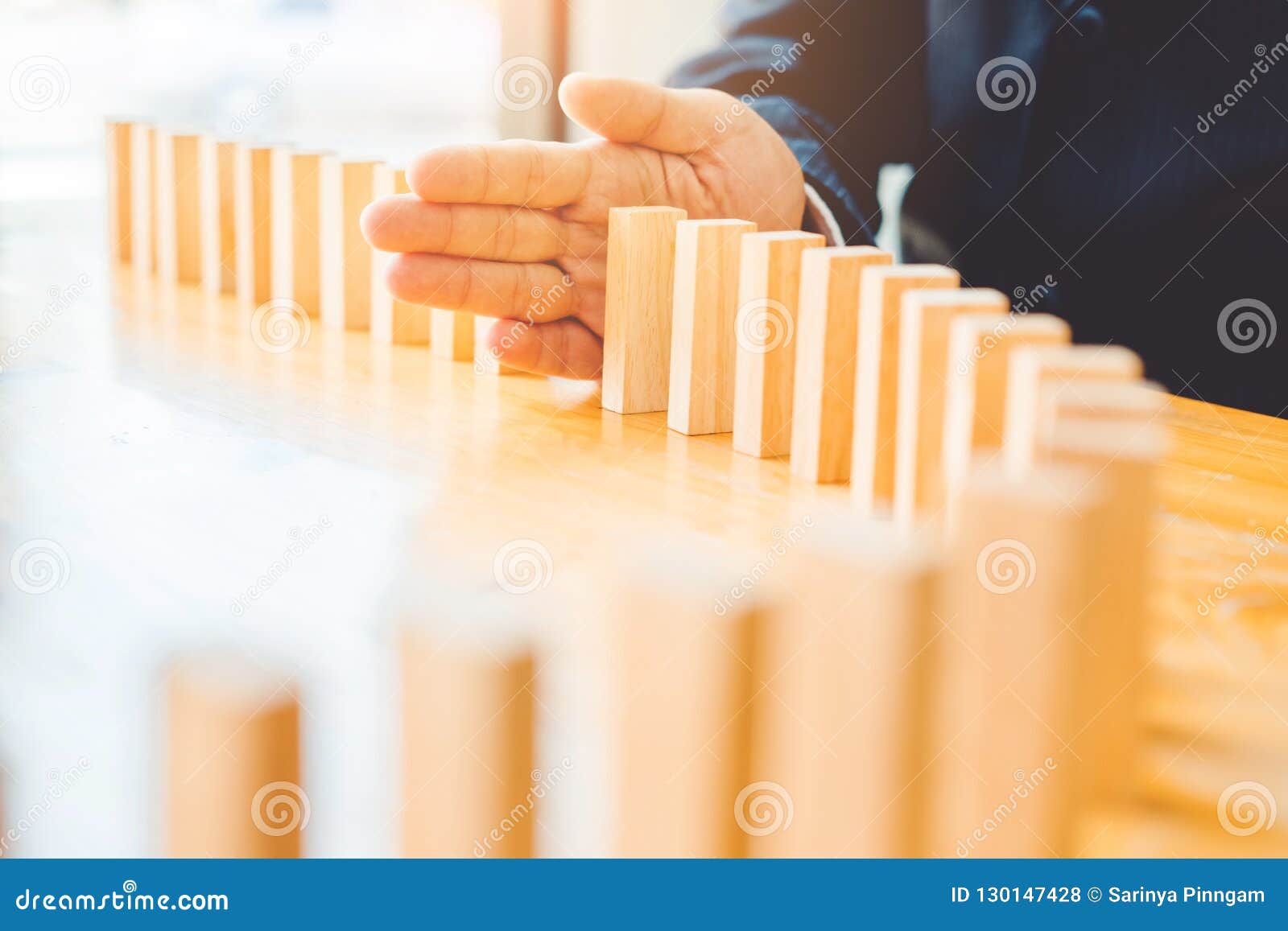 Businessman Plan and Strategy in Business Domino Effect Problem Stock ...