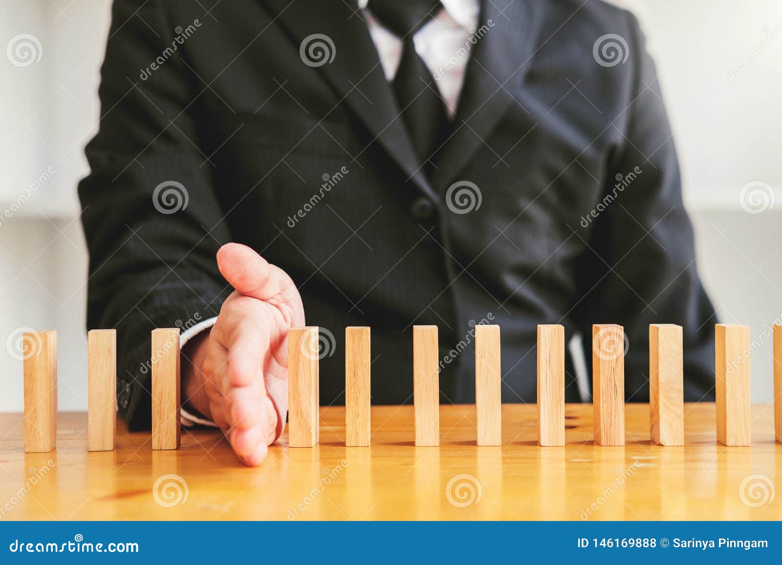 Businessman Plan and Strategy in Business Domino Effect Problem Solving ...