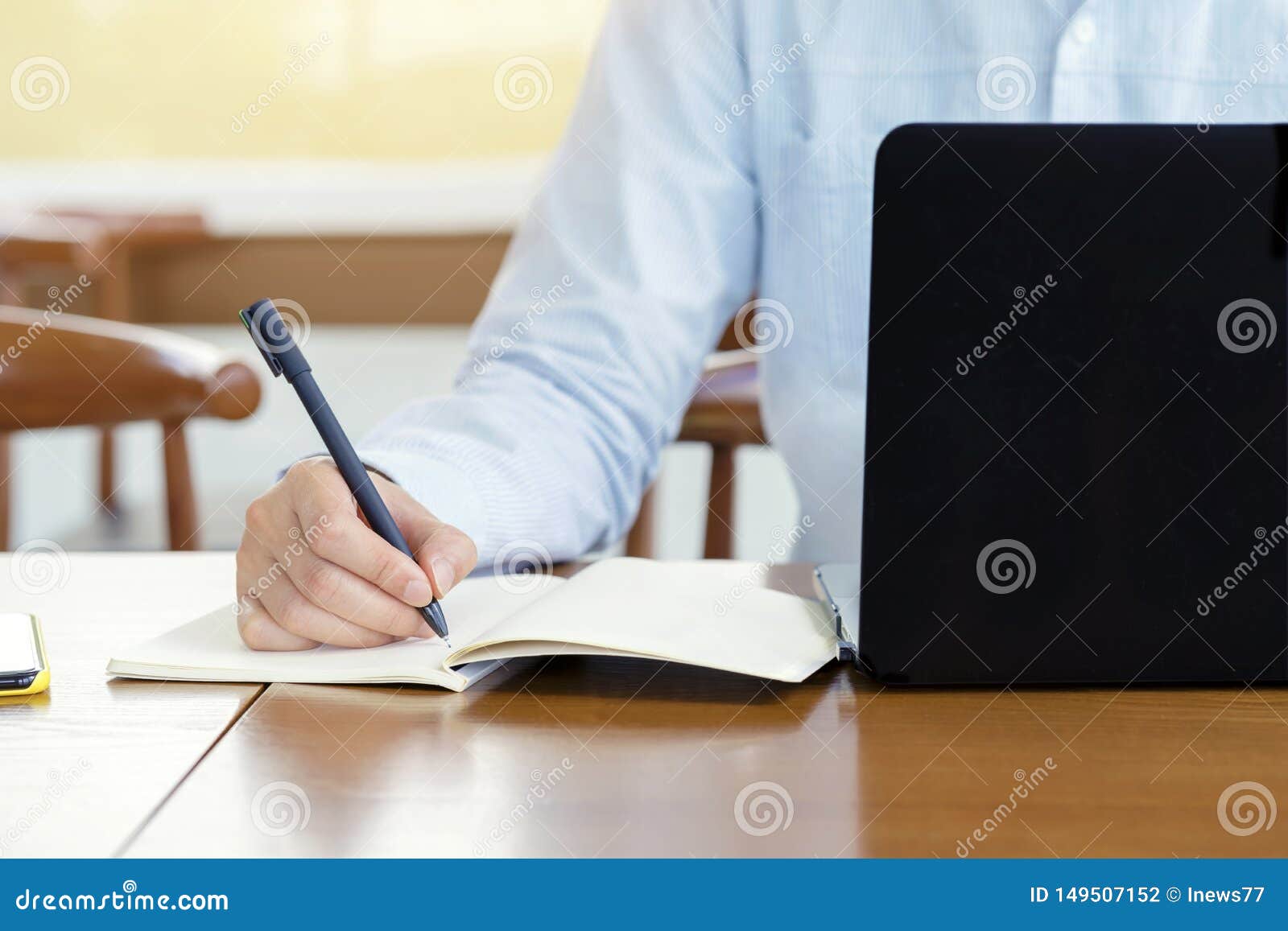 Businessman Planning Writing Note and Working with Laptop Computer on ...