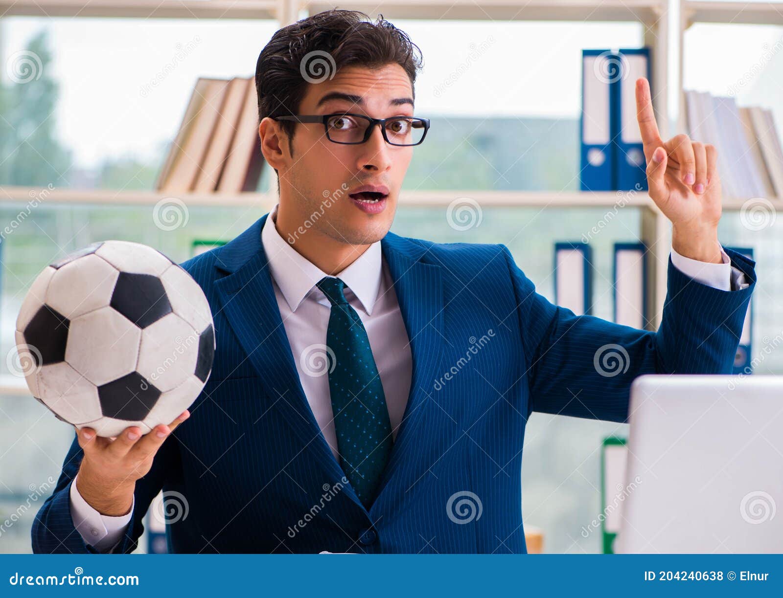 Businessman Playing Football in the Office Stock Photo - Image of ...