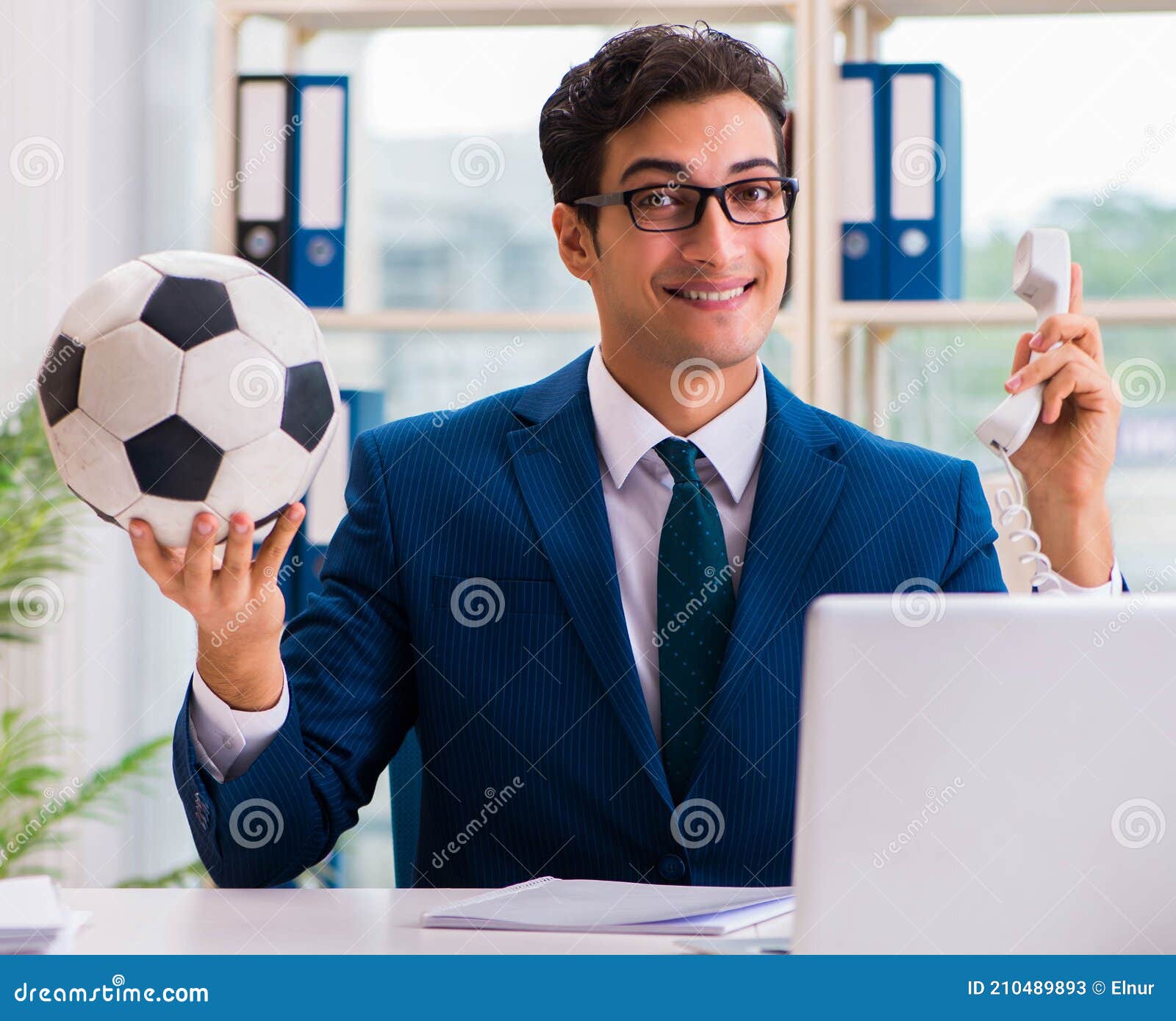 Businessman Playing Football in the Office Stock Image - Image of ...