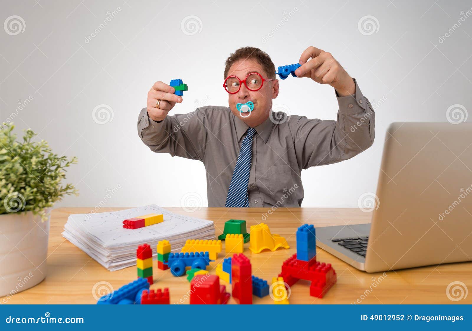 Businessman playing lego stock photo. Image of childish - 49012952