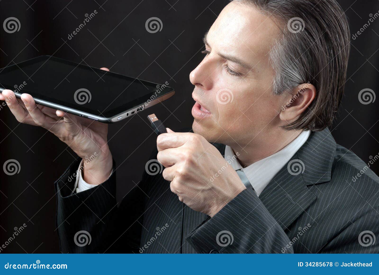 Businessman Plugs in Tablet Stock Photo - Image of computer, shirt ...