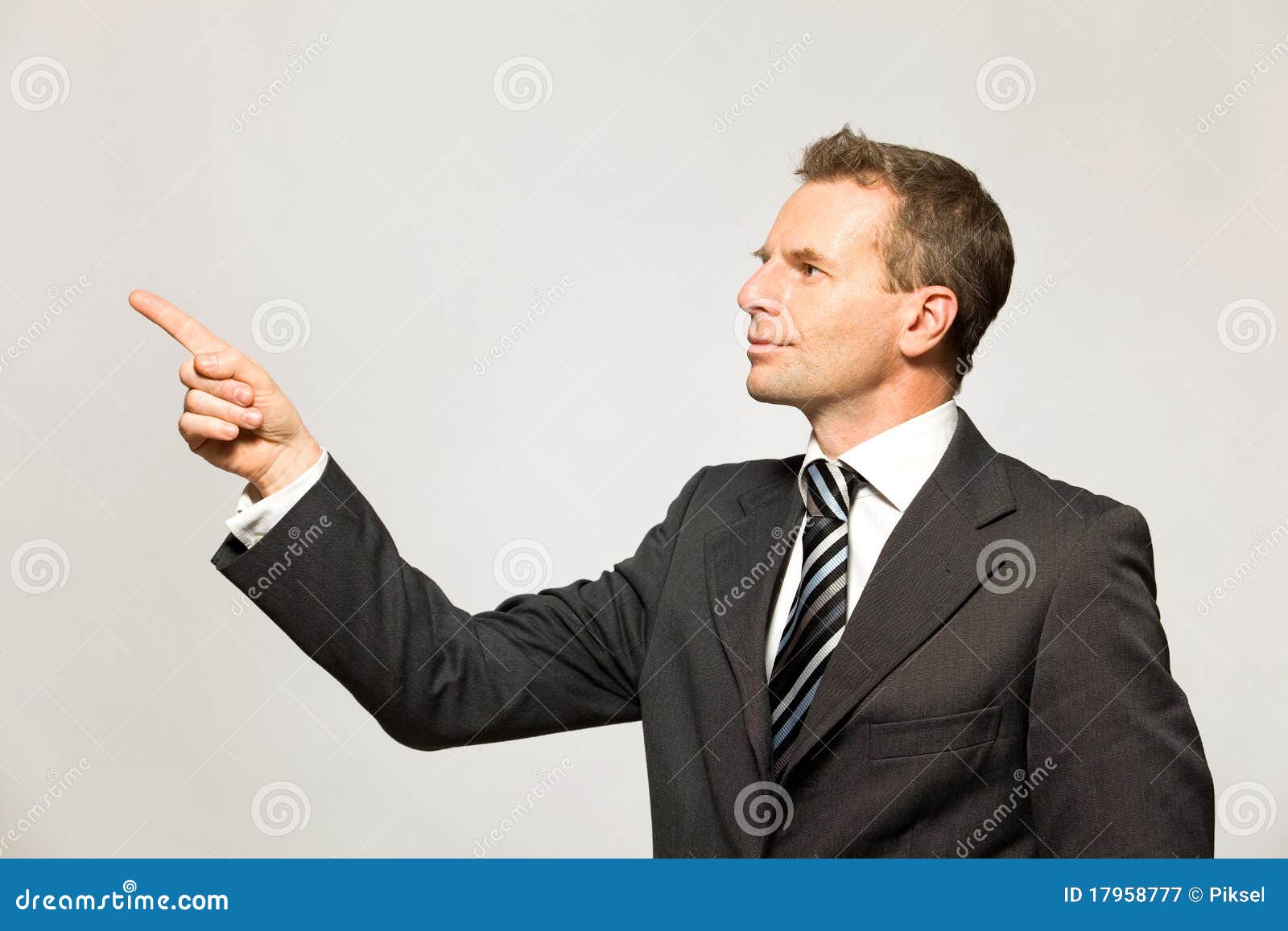 Businessman pointing stock image. Image of executive - 17958777