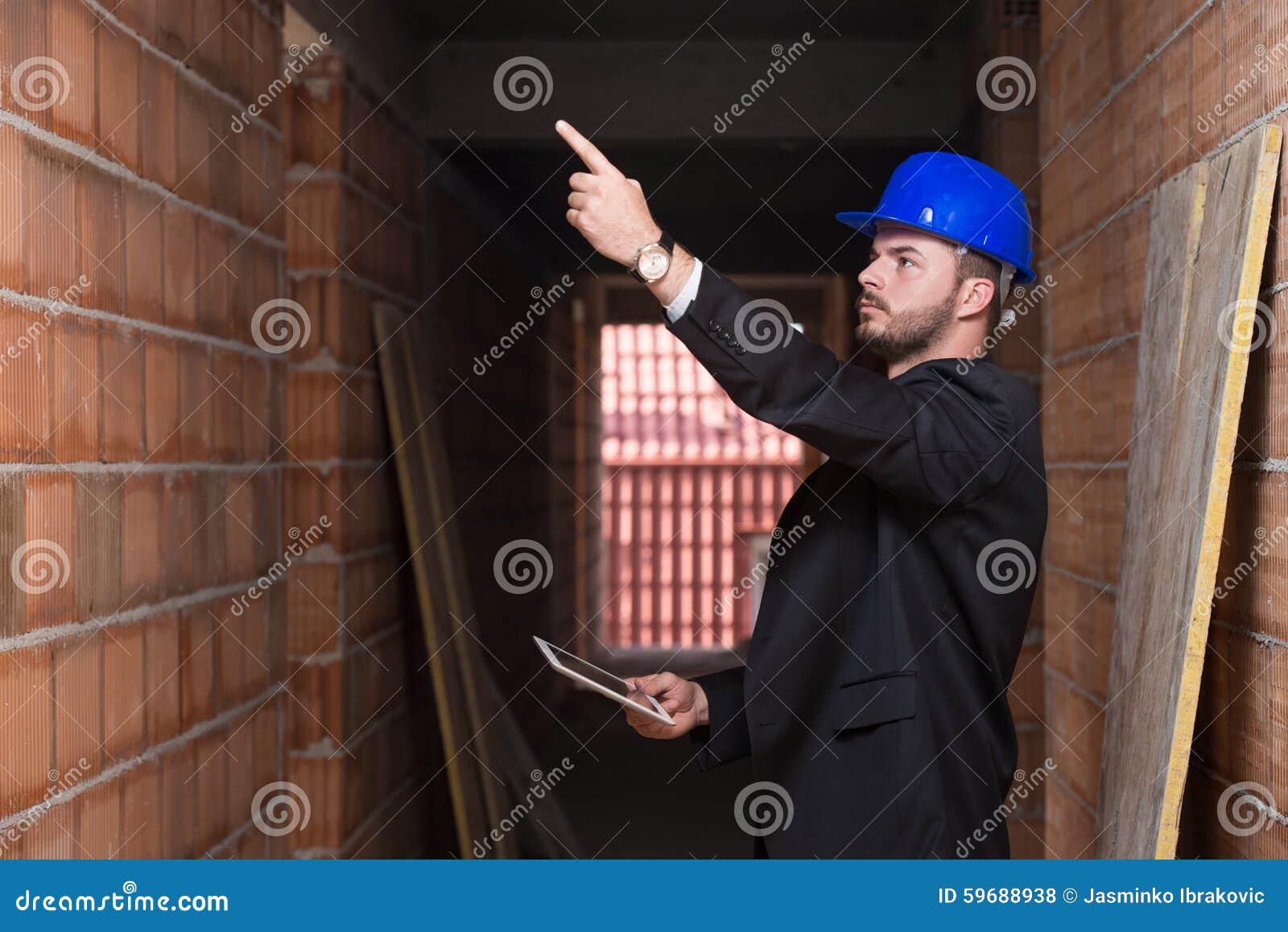 Businessman Pointing on Ceiling Stock Photo - Image of good, architect ...