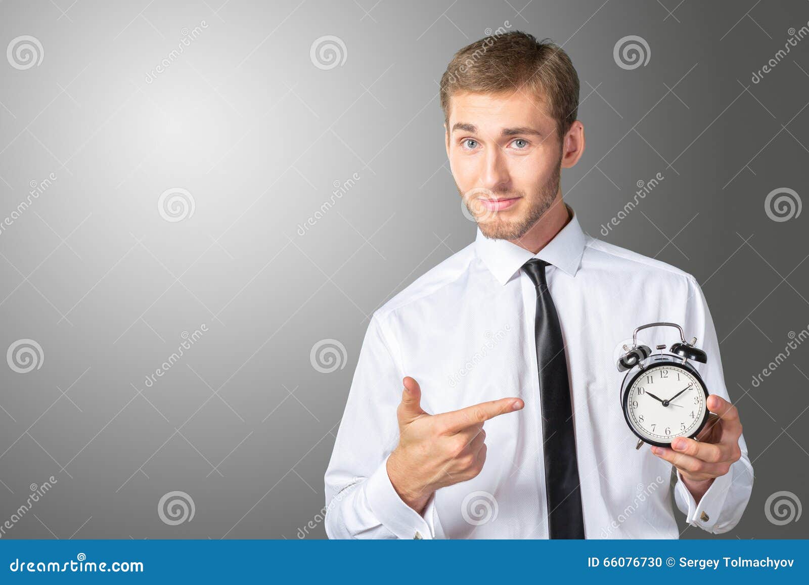 Businessman Pointing at Clock Stock Photo - Image of suit, business ...