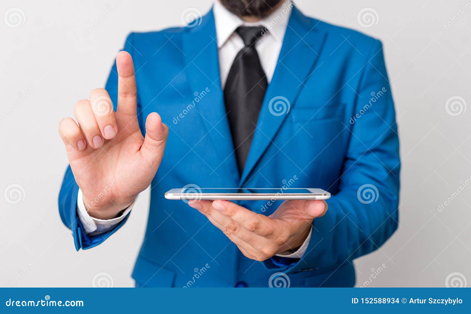 Businessman with Pointing Finger in Front of Him. Businessman Holds Lap ...