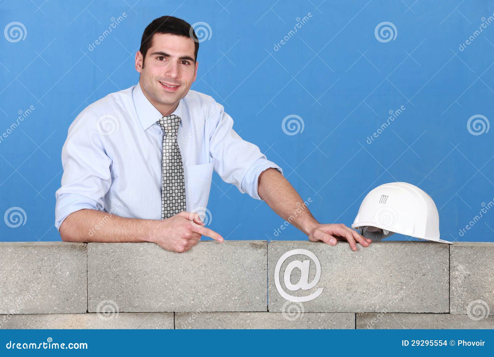 Businessman Pointing at Sign Stock Photo - Image of industry, clothes ...