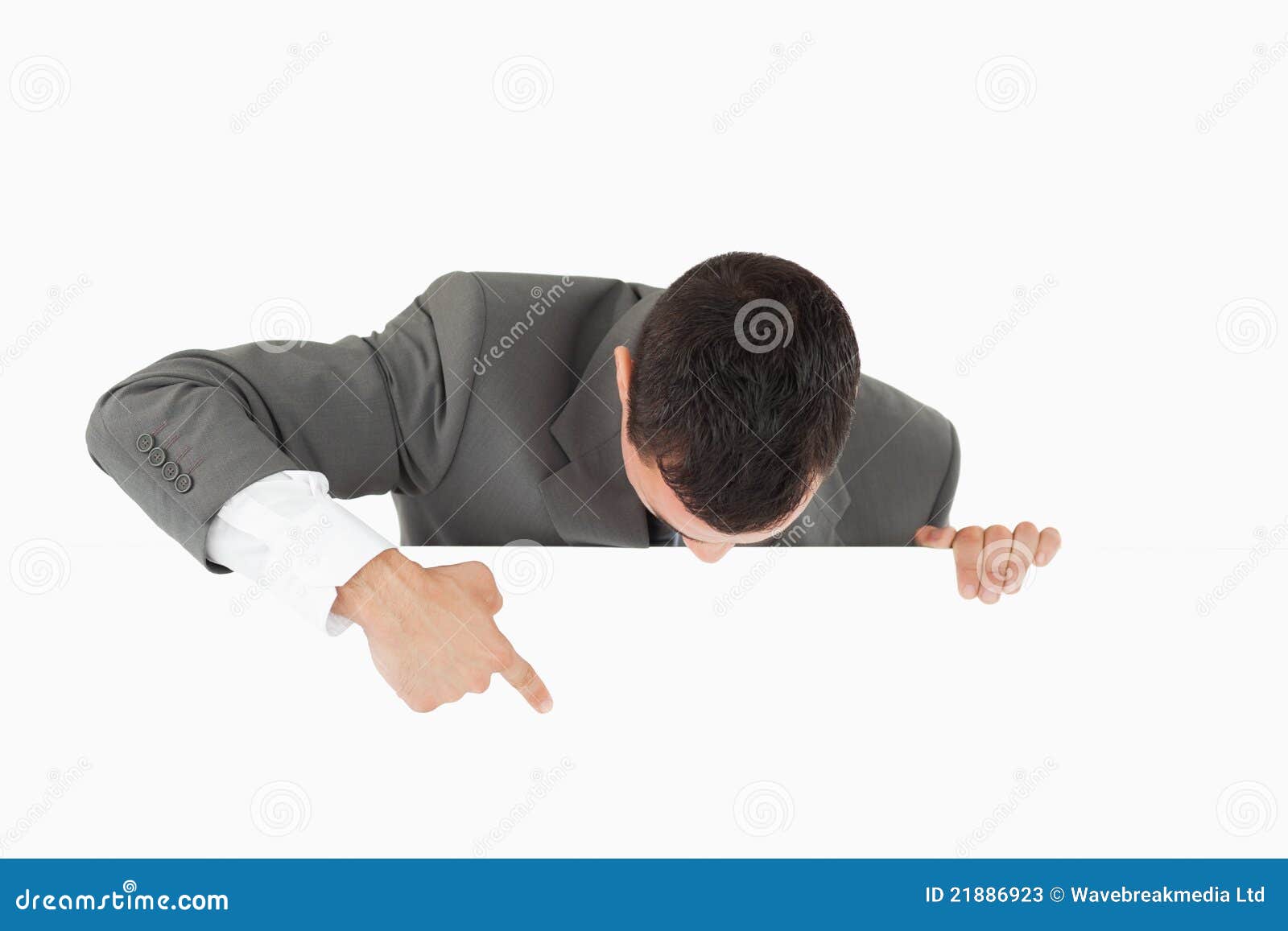 Businessman Pointing on Sign Below Him Stock Image - Image of billboard ...