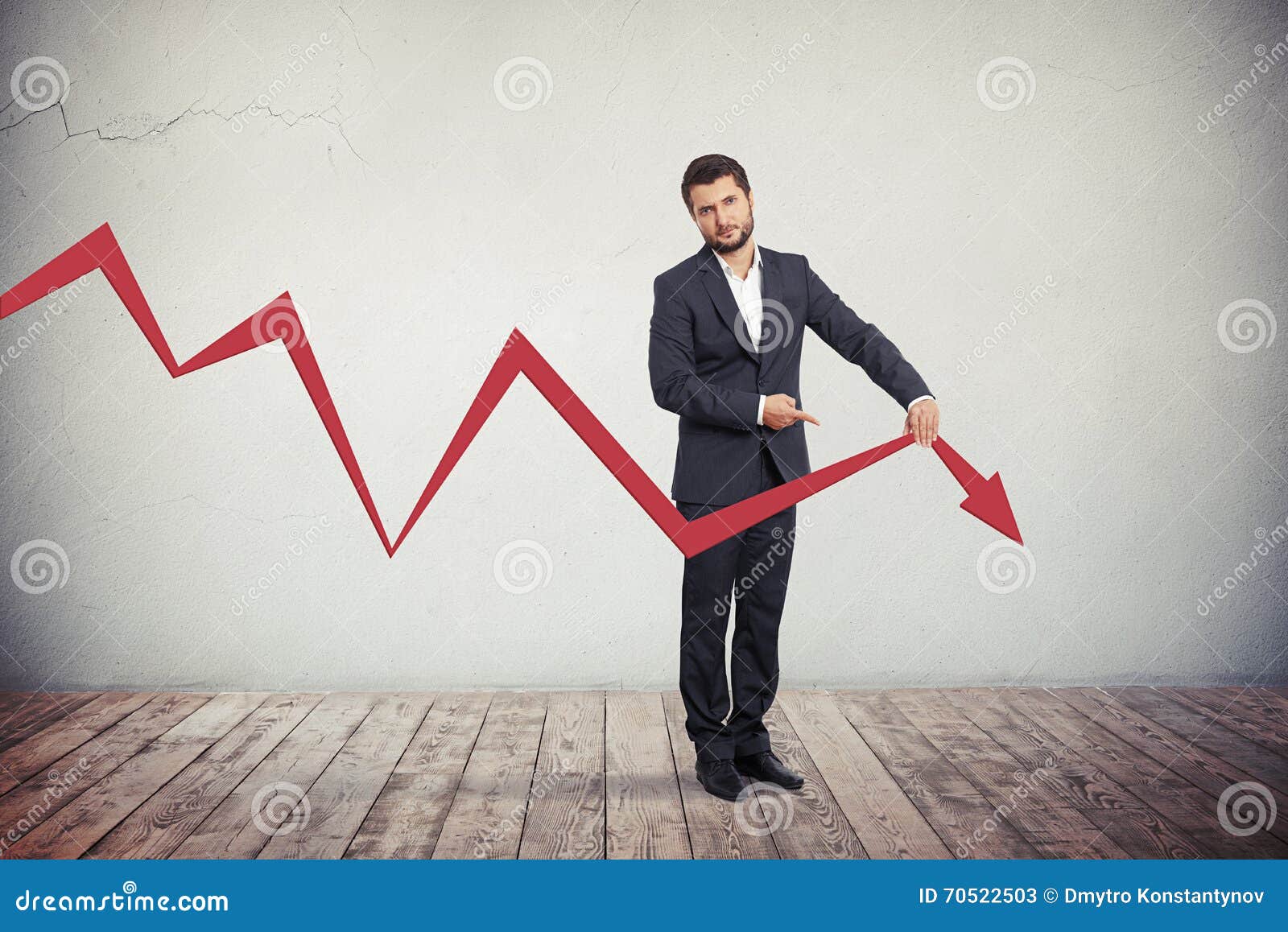 Businessman Pointing To Red Graph Arrow Down. Stock Image - Image of ...