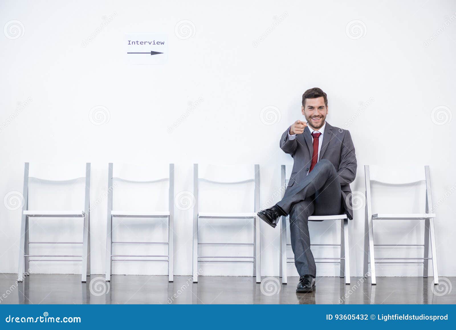 Businessman Pointing and Waiting for Interview in Office Stock Photo ...