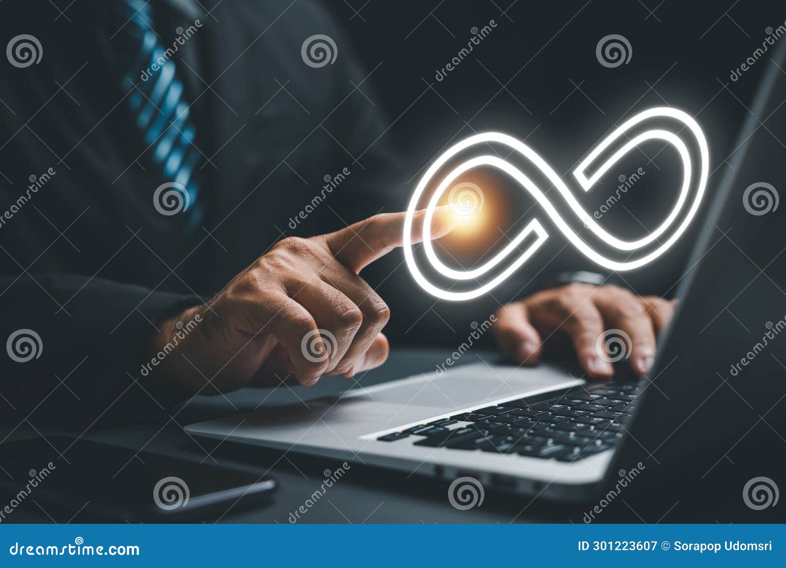 Businessman Points To Infinity Symbol, Representing Limitless ...