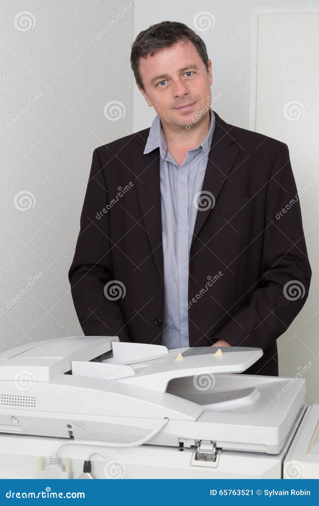 Businessman Portrait at Copy Machine Stock Image - Image of portrait ...