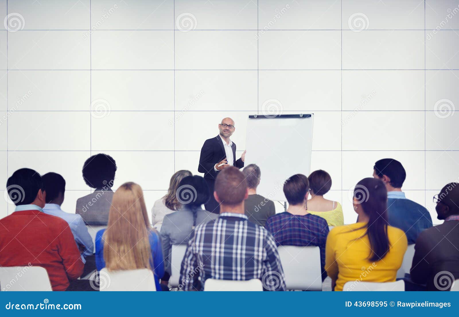 Businessman Presenting in Front of Audience Stock Image - Image of ...