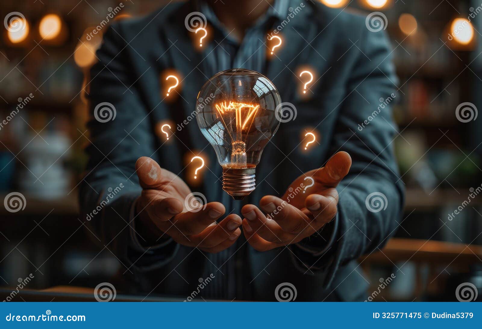 Businessman Presenting Innovative Light Bulb with Question Marks Stock ...