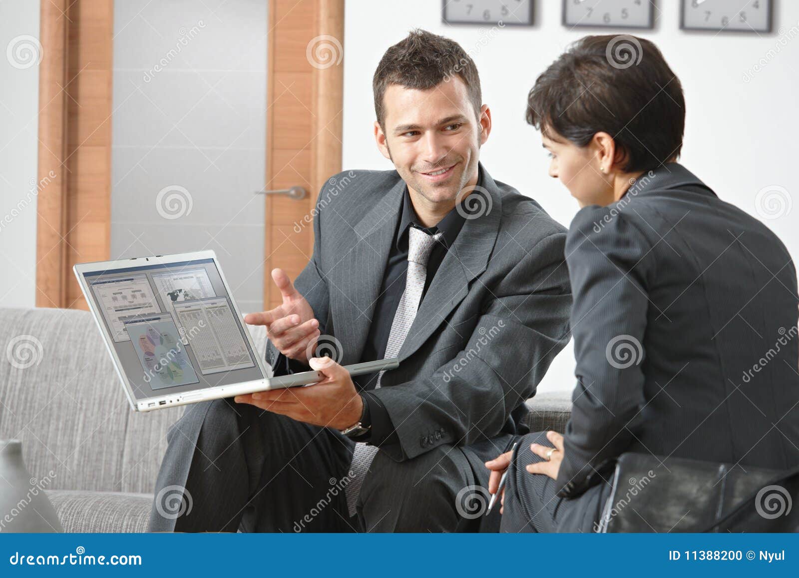 Businessman Presenting on Laptop Stock Photo - Image of explaining ...