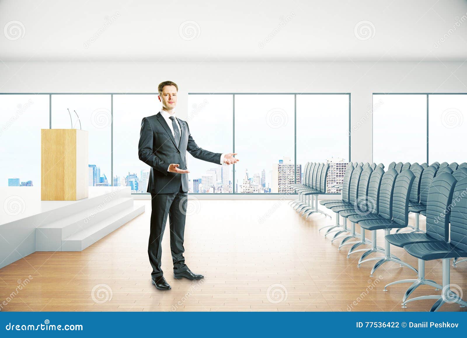Businessman Presenting Something Stock Photo - Image of adult, inside ...